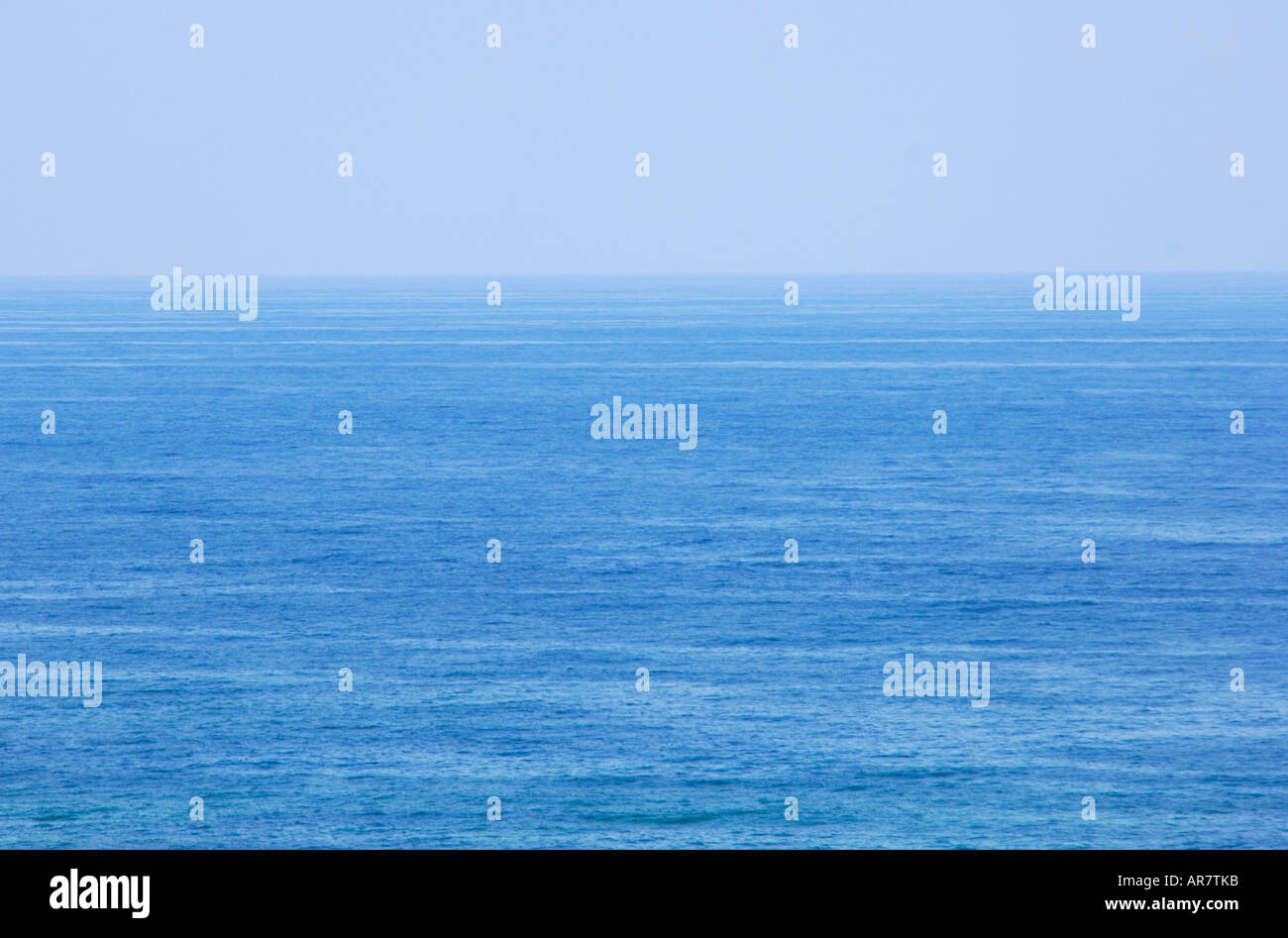 Blue Ocean and Blue Sky with a faded Horizon Stock Photo - Alamy