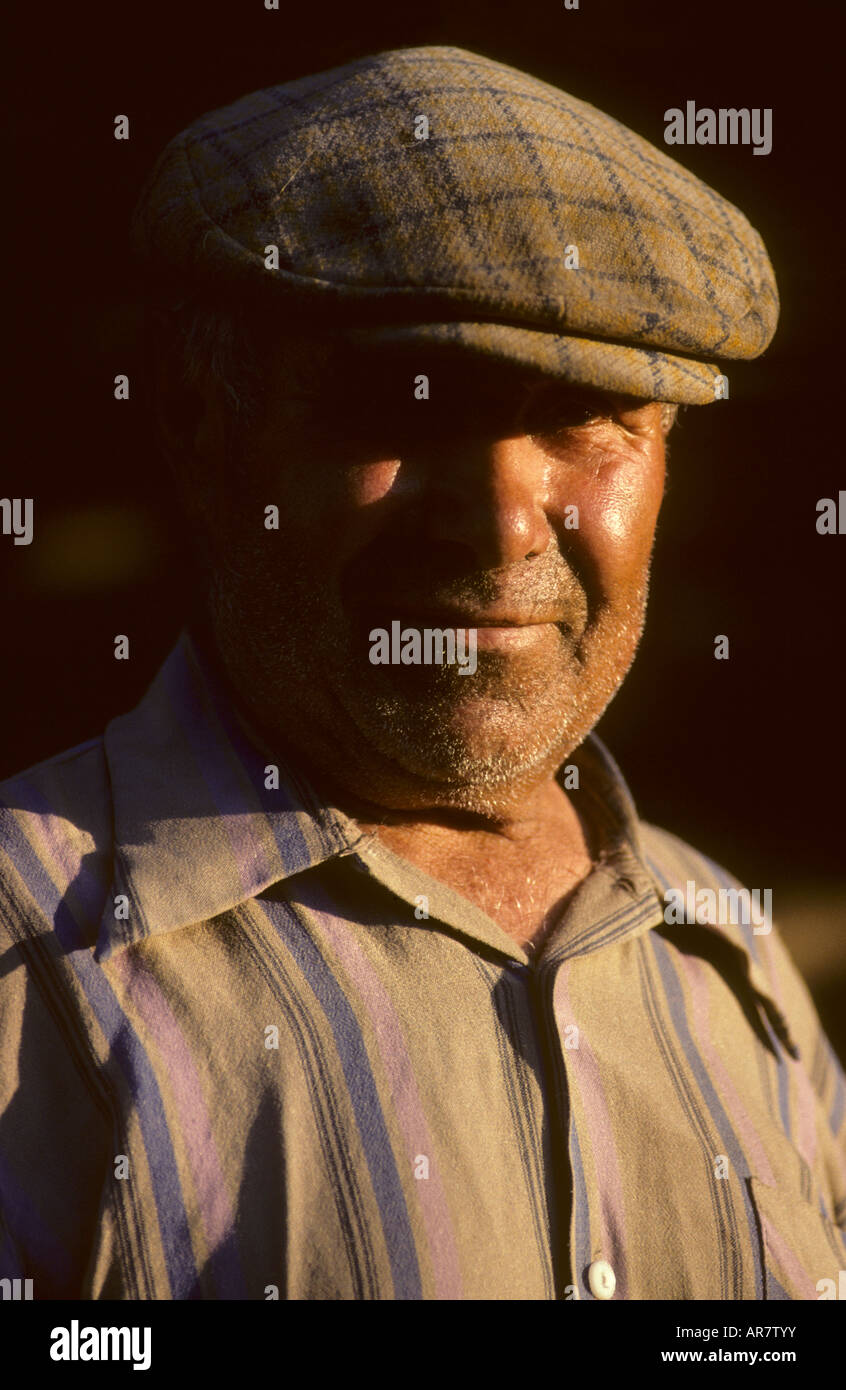 Siberian man with hat poses in late afternoon light Stock Photo - Alamy