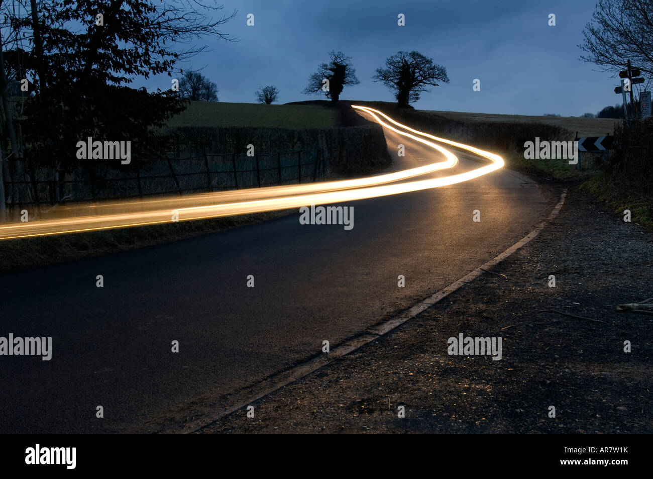 Light trails on a country road Stock Photo - Alamy