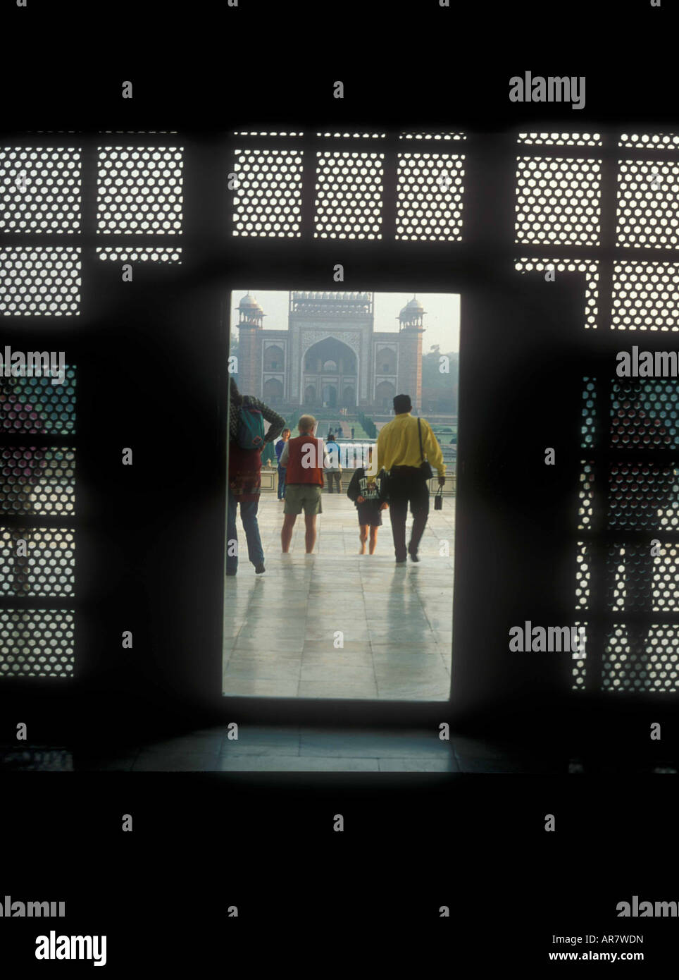 The Taj Mahal framed through a window Stock Photo - Alamy