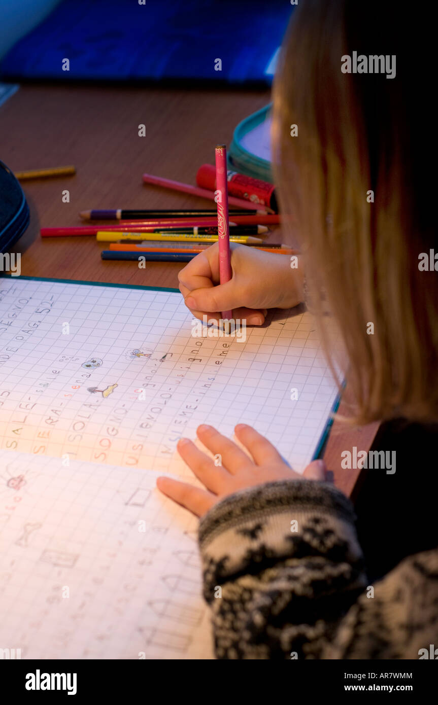 a little girl doing her homework at home Stock Photo - Alamy