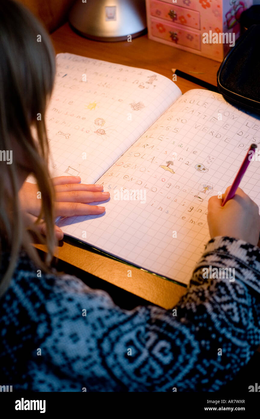 a little girl doing her homework at home Stock Photo - Alamy