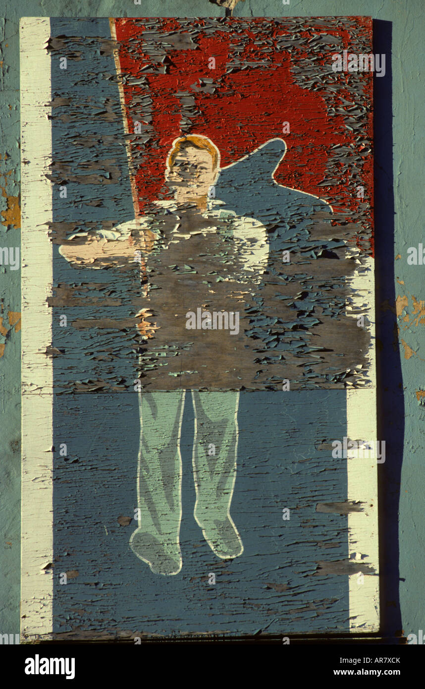 A weathered Soviet Union patriotic poster in Norilsk, Siberia, Russia ...