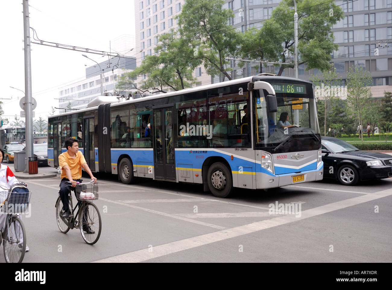 Articulated Bendy Bus with woman driver Beijing Stock Photo - Alamy