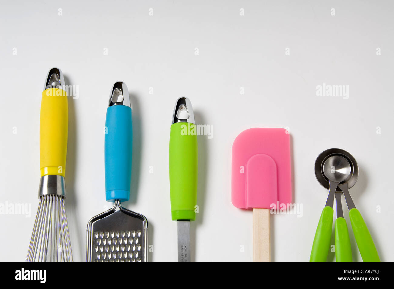 Kitchen utensils with neon accents Stock Photo - Alamy
