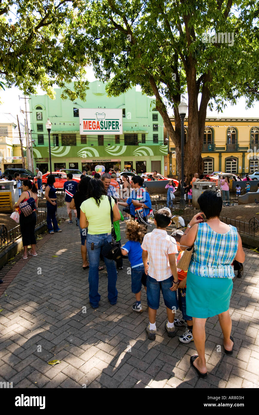 Costa Rica Alajuela Parque Central crowd around itinerant photographer ...