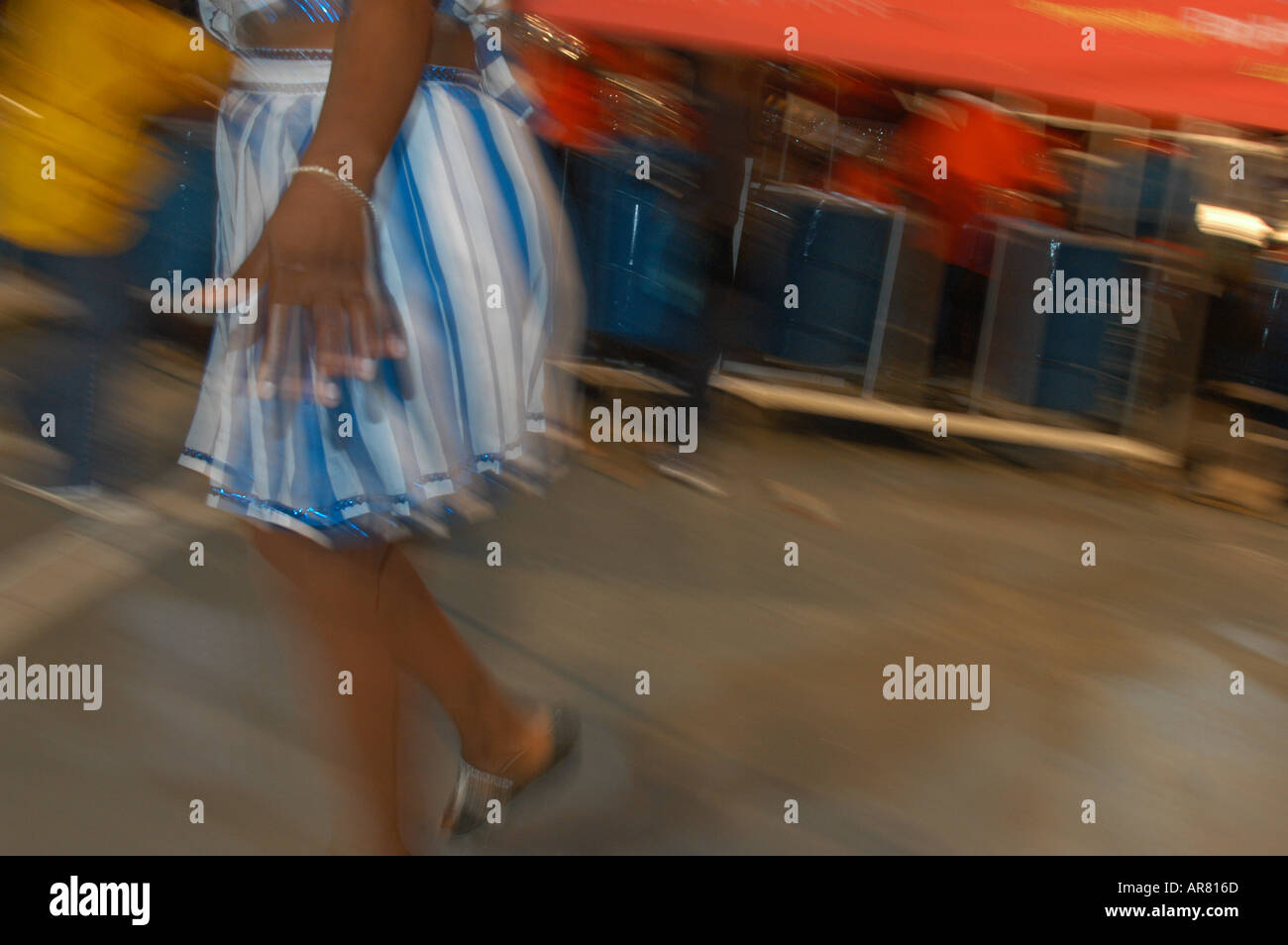 woman walking, carnival street scene, Trinidad Stock Photo - Alamy