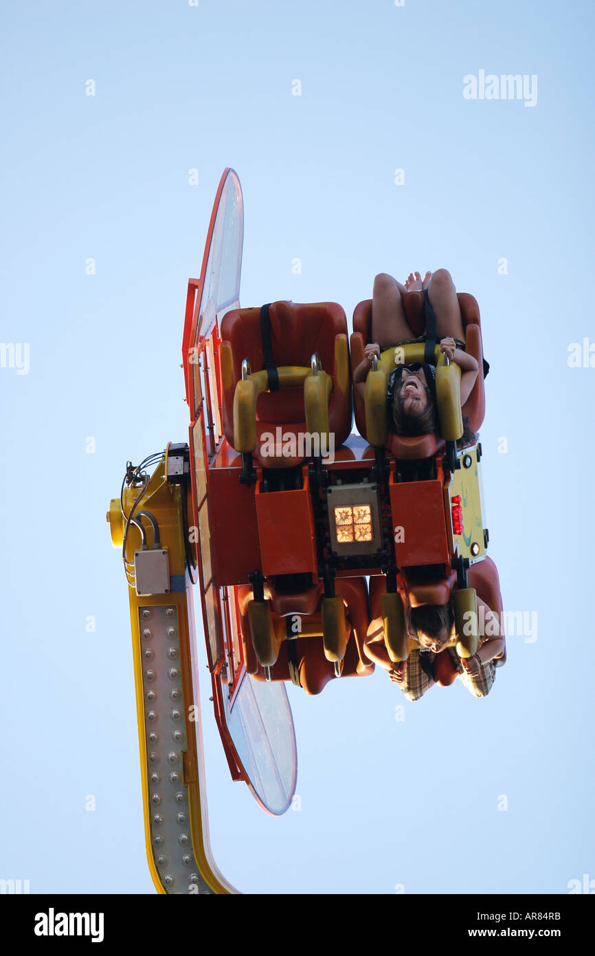 Tivoli ride in a fast spinning attraction Stock Photo - Alamy