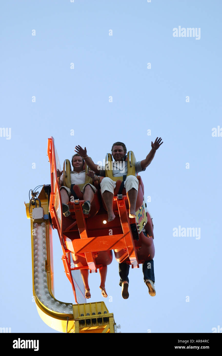 Tivoli ride in a fast spinning attraction Stock Photo - Alamy