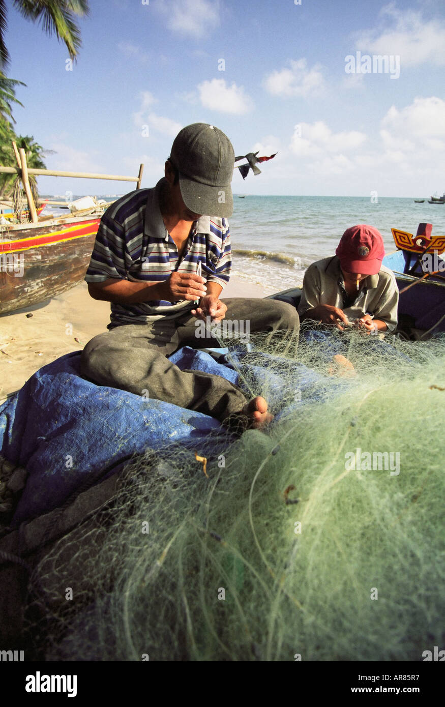 Reparing nets hi-res stock photography and images - Alamy