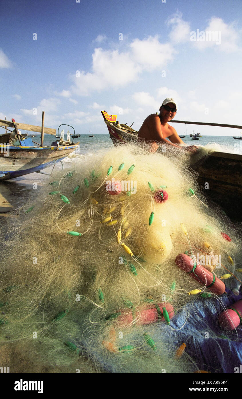 Vietnamese Fisherman Preparing Nets Stock Photo - Alamy