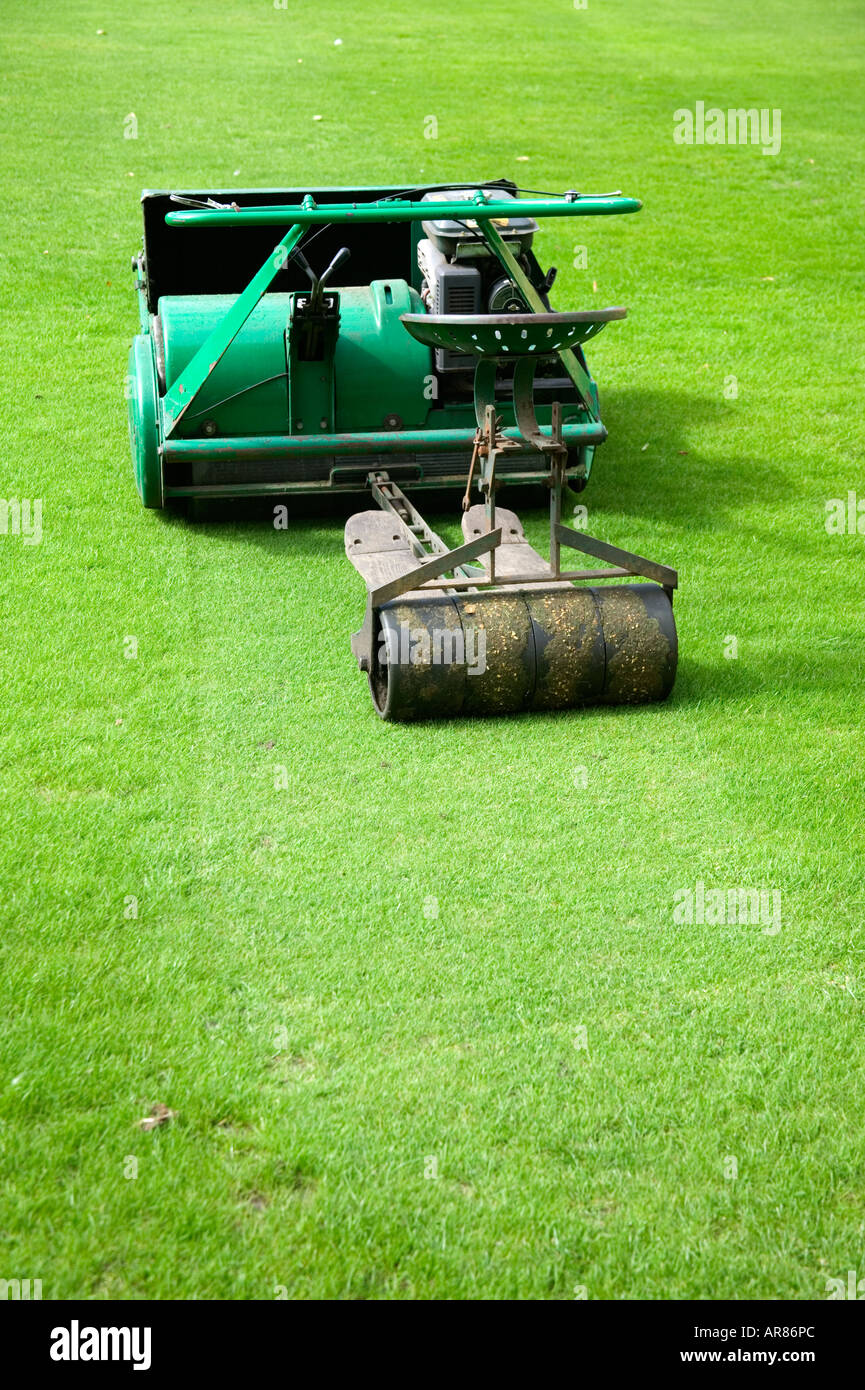 Large lawn mowing and flattening machine Stock Photo - Alamy