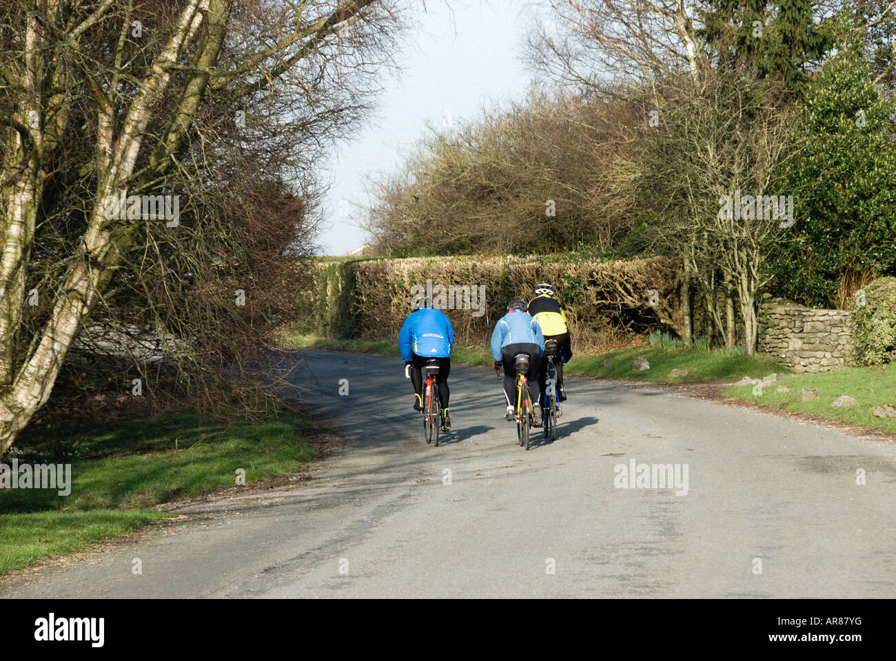 Cyclists on quiet lane hi-res stock photography and images - Alamy