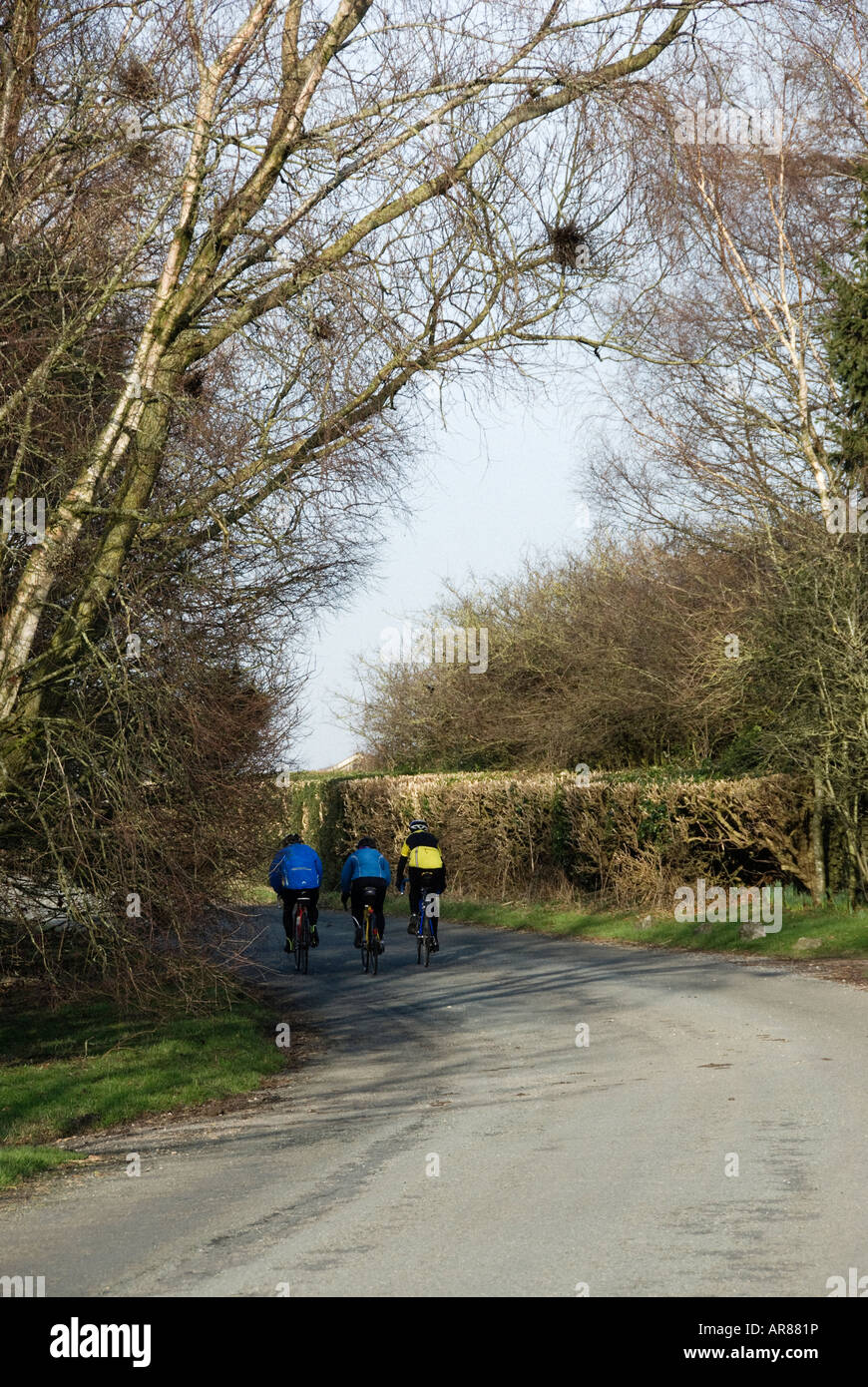Cyclists on quiet lane hi-res stock photography and images - Alamy