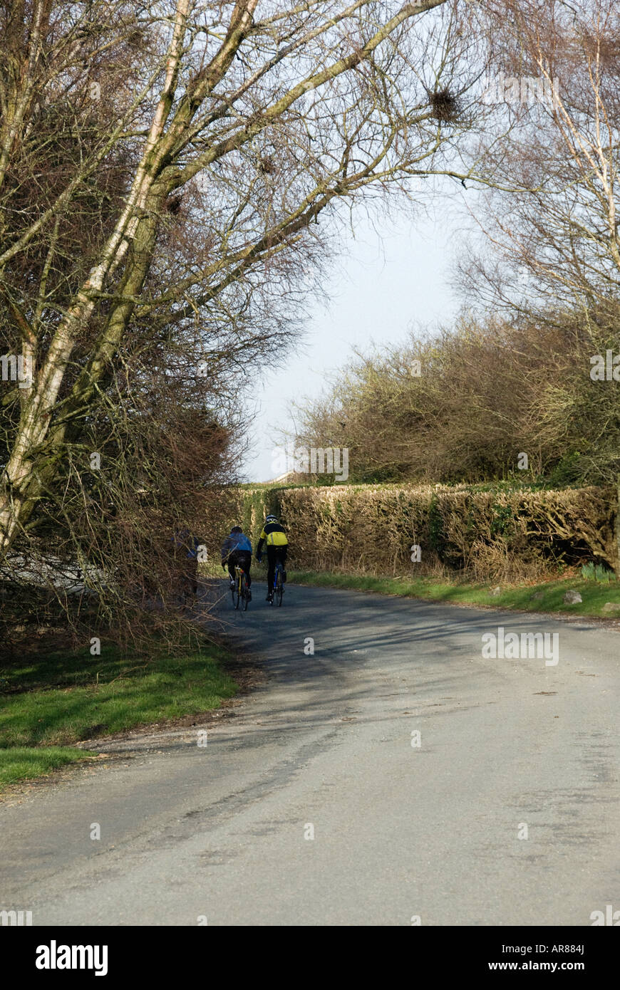 Cyclists on quiet lane hi-res stock photography and images - Alamy