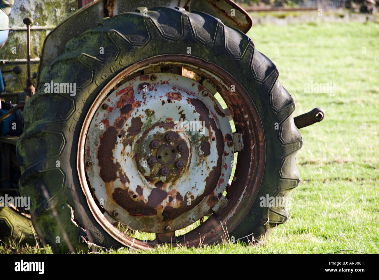 rear wheel of old tractor Stock Photo - Alamy