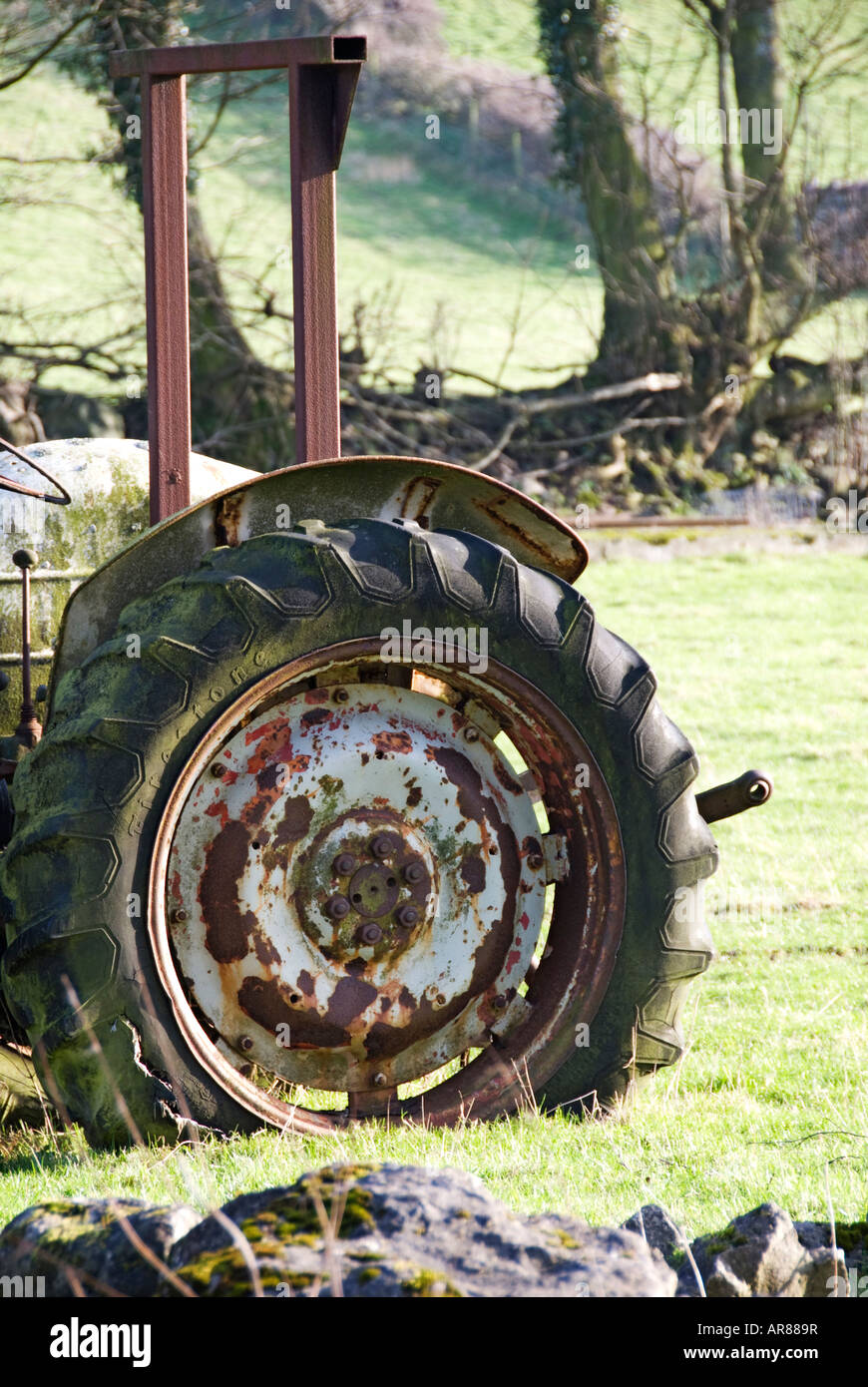 rear wheel of old tractor Stock Photo - Alamy