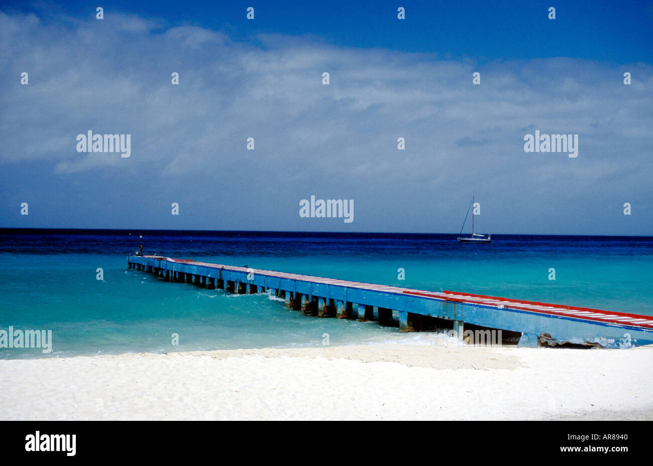 Jetty on Tropical Beach Stock Photo - Alamy