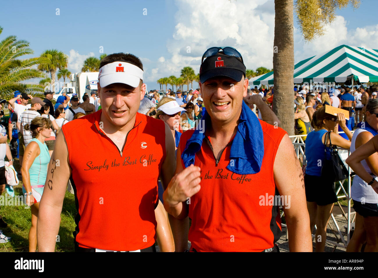 Two Male Marathon Triathlon Runners at Finish Line Stock Photo - Alamy