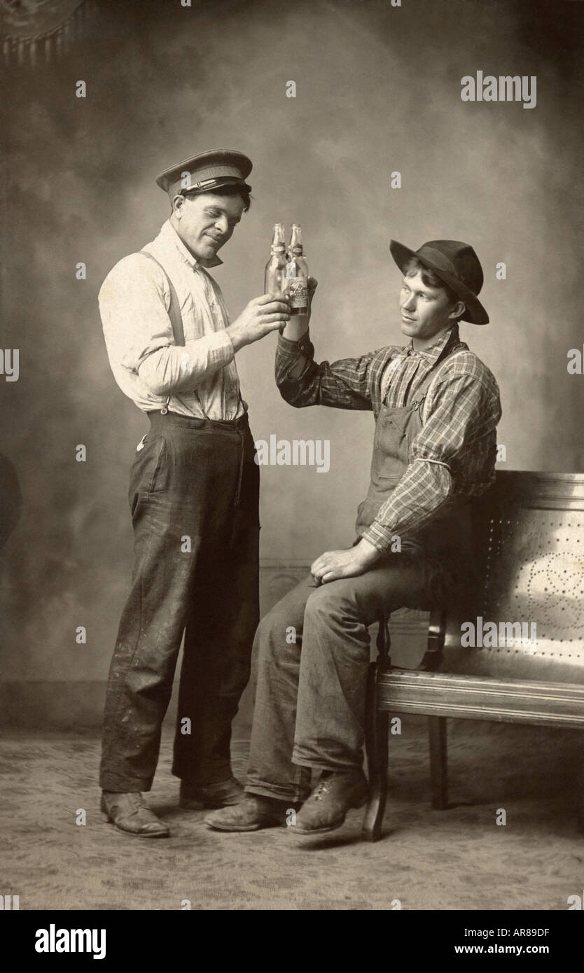 Vintage Photo of Two Men Toasting With Beers Stock Photo - Alamy