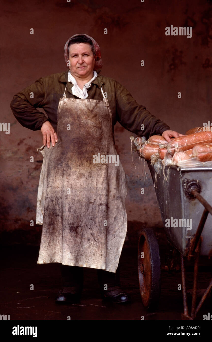 Female Russian Meat Factory worker beside a cart of Sausages, Moscow ...