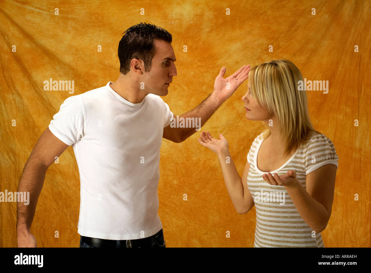 A young couple having an argument Stock Photo - Alamy