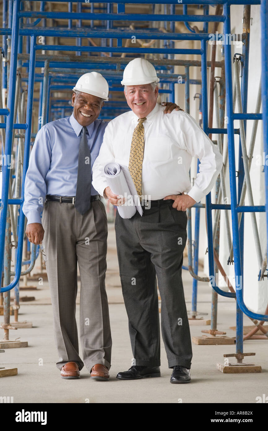 Portrait of two engineers smiling Stock Photo - Alamy