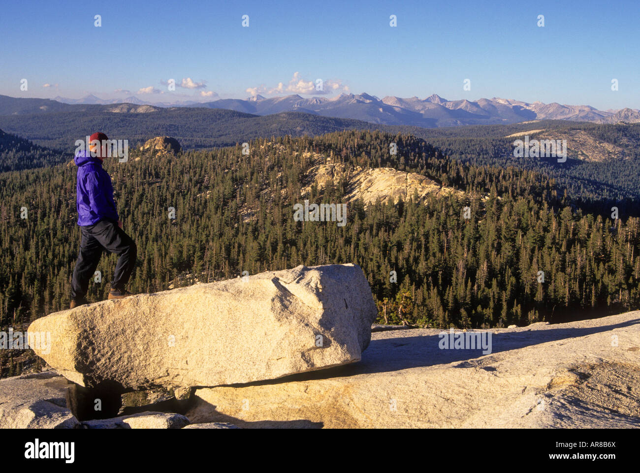 Hiker overlooks the Dinkey Lakes Wilderness, Sierra National Forest ...