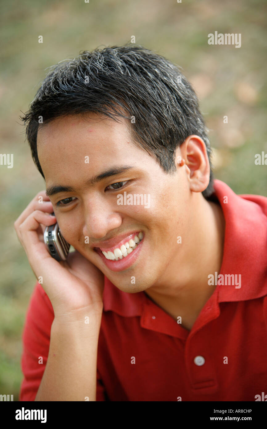 Filipino man on the phone hi-res stock photography and images - Alamy