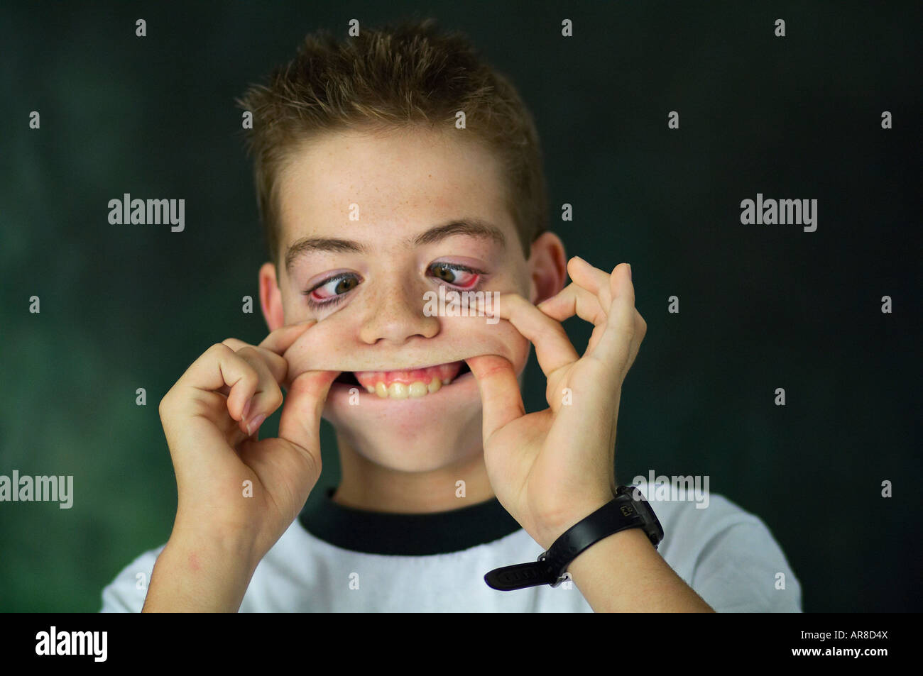 A young boy making a silly face Stock Photo - Alamy