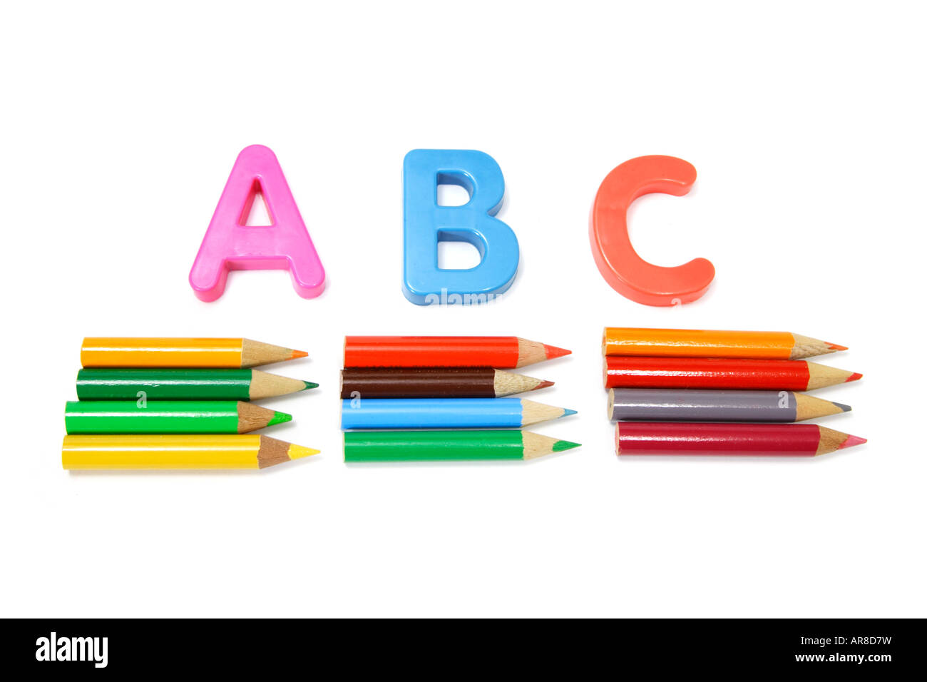Colour Pencils and Alphabets Stock Photo - Alamy