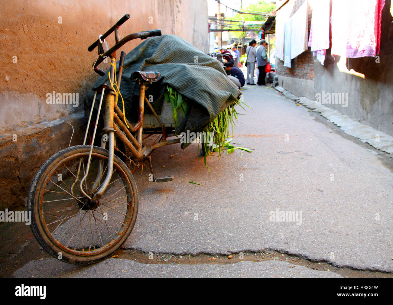 Old bicycle parked in a “hutong” lane, in Beijing Stock Photo - Alamy