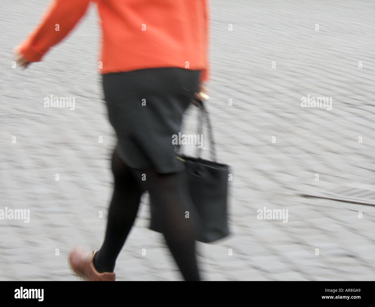 old woman walking with handbag Stock Photo - Alamy