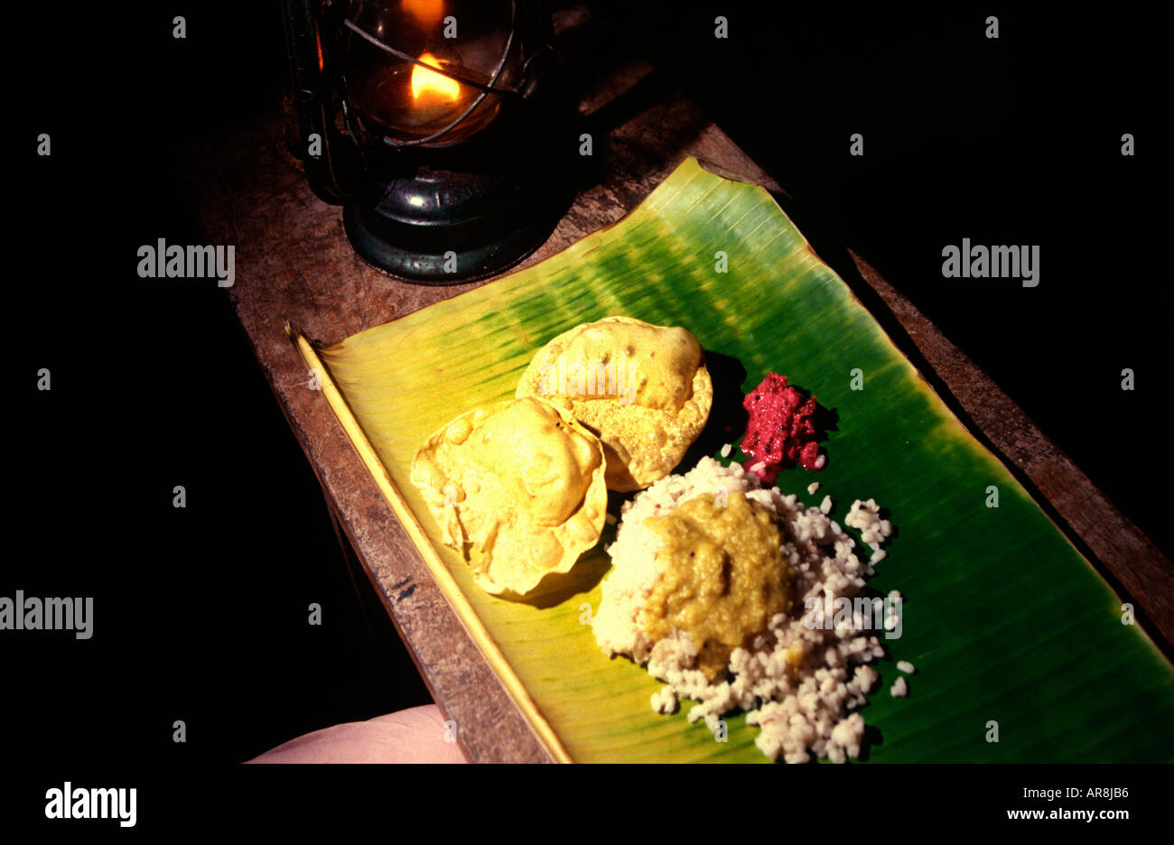Typical South Indian Thali meal served on a banana leaf Stock Photo - Alamy
