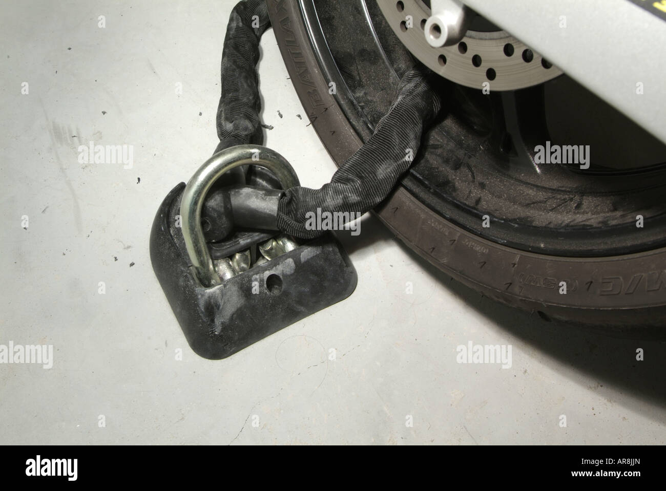 chain lock on a motorbike wheel Stock Photo - Alamy