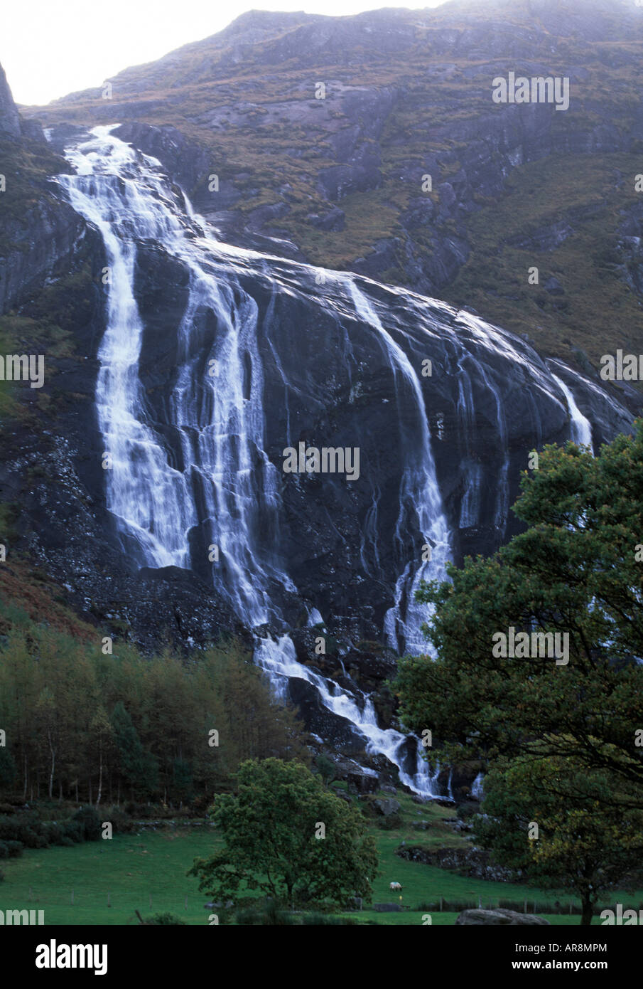 waterfall flowing over steep cliff Stock Photo - Alamy