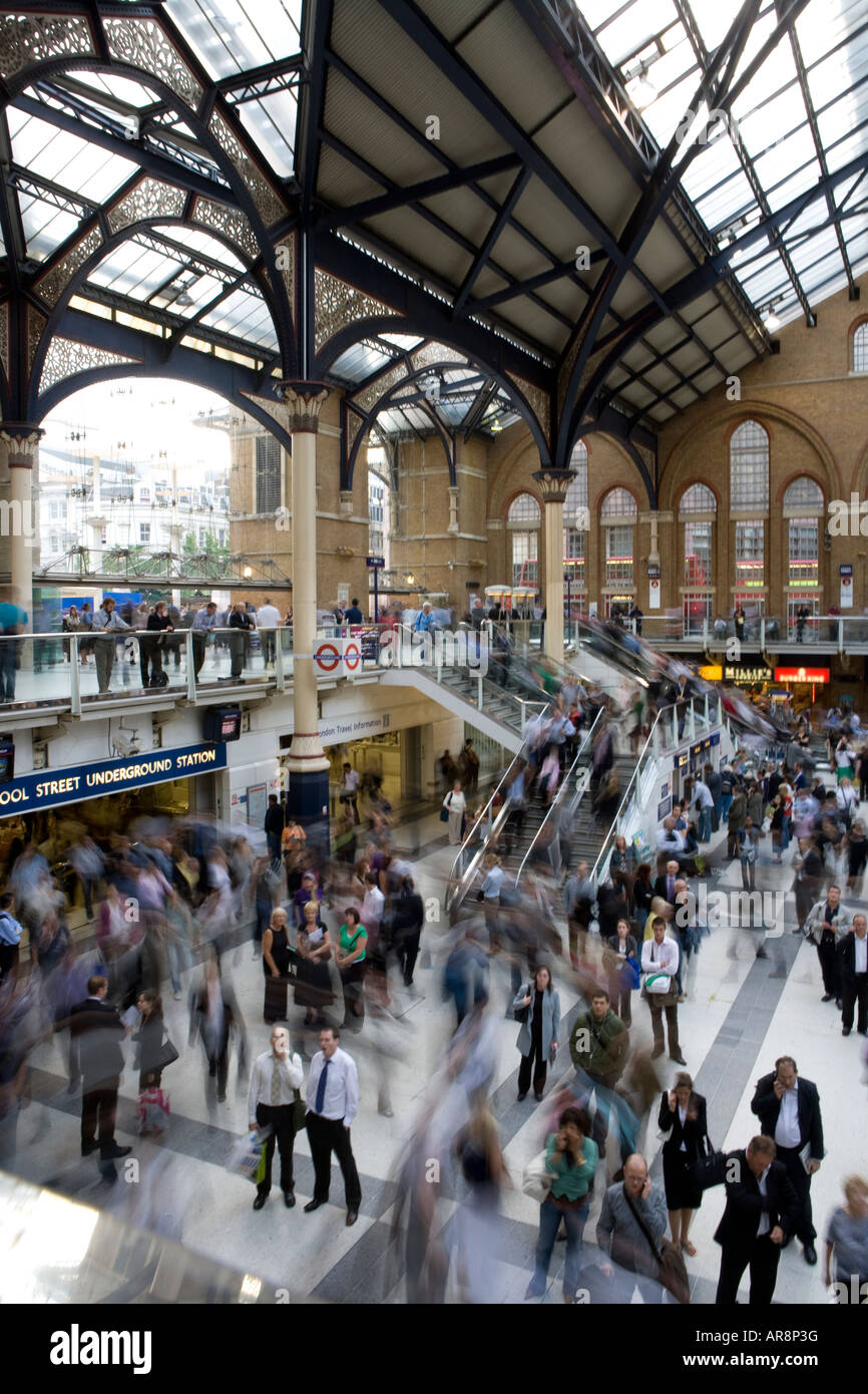 commuters at busy station Stock Photo - Alamy