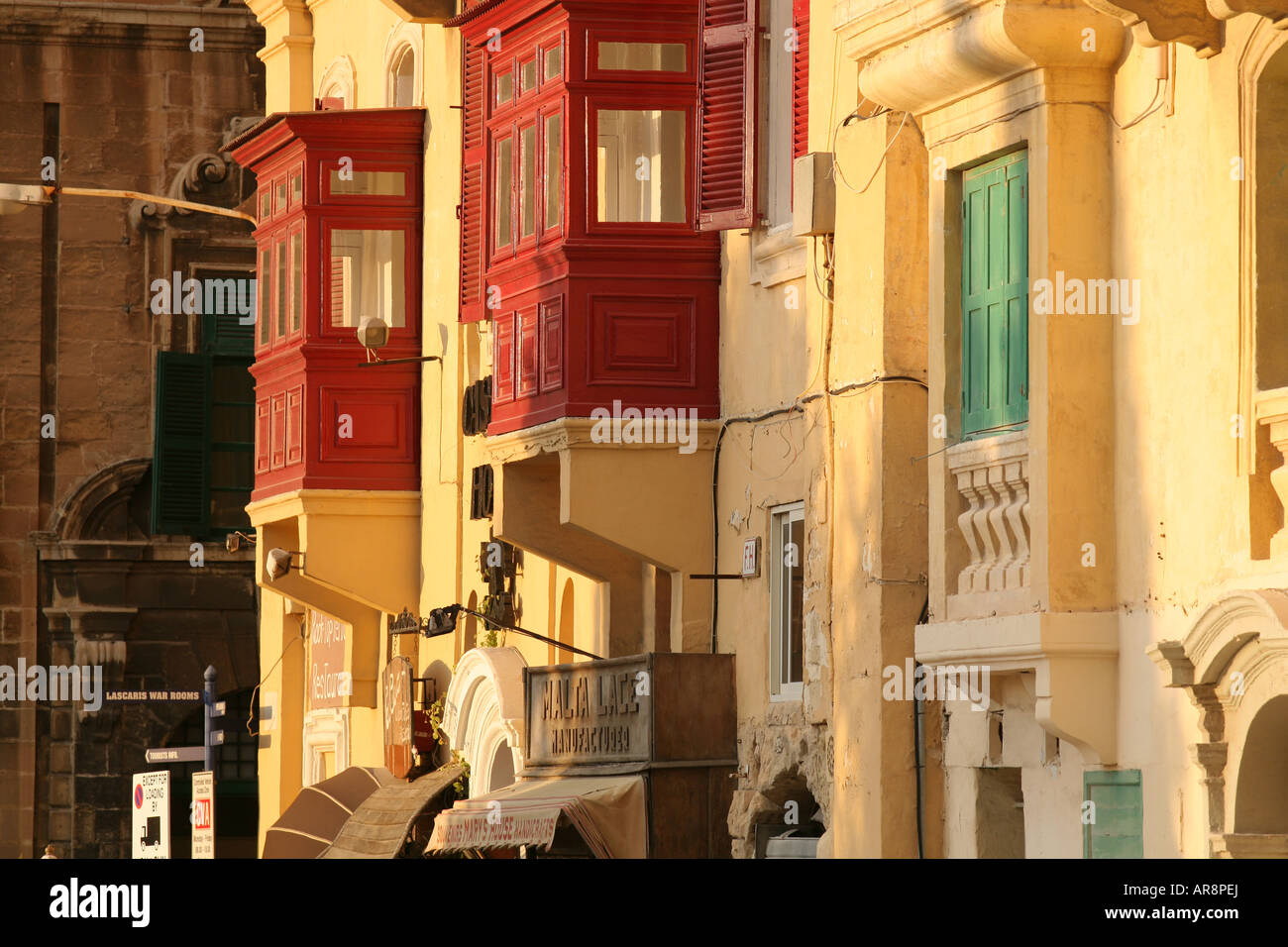 Brightly coloured shuttered windows in Valetta Capital of Malta Stock ...