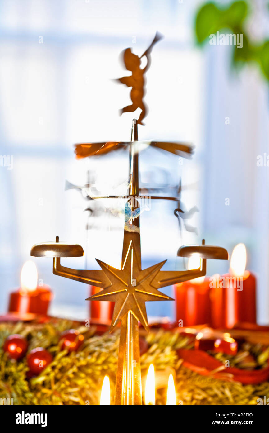 CHRISTMAS DECORATIONS ANGELS TURNING AROUND RINGING BELLS Stock Photo ...