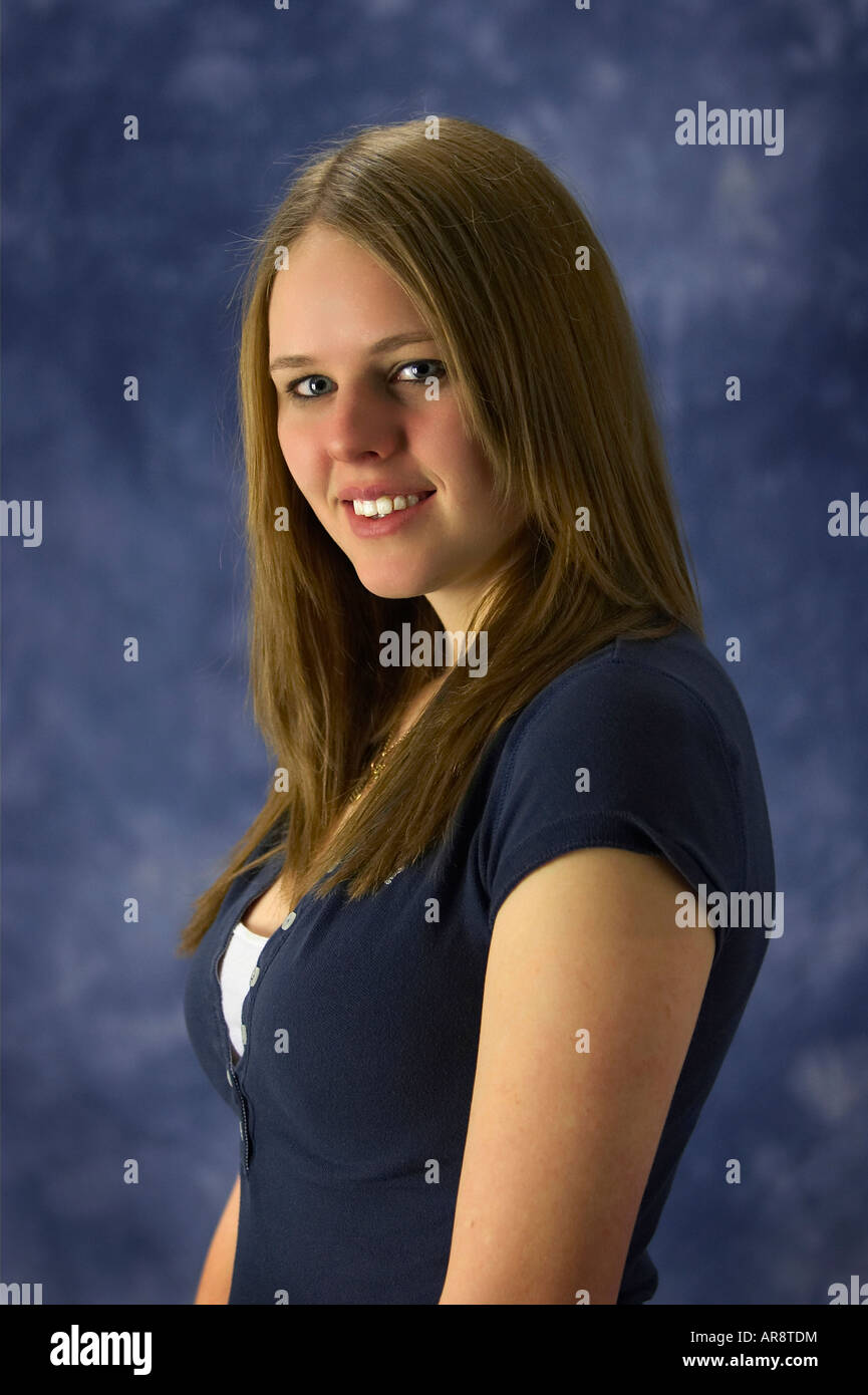 A young woman (caucasian 19 years old) smiling at camera Stock Photo ...