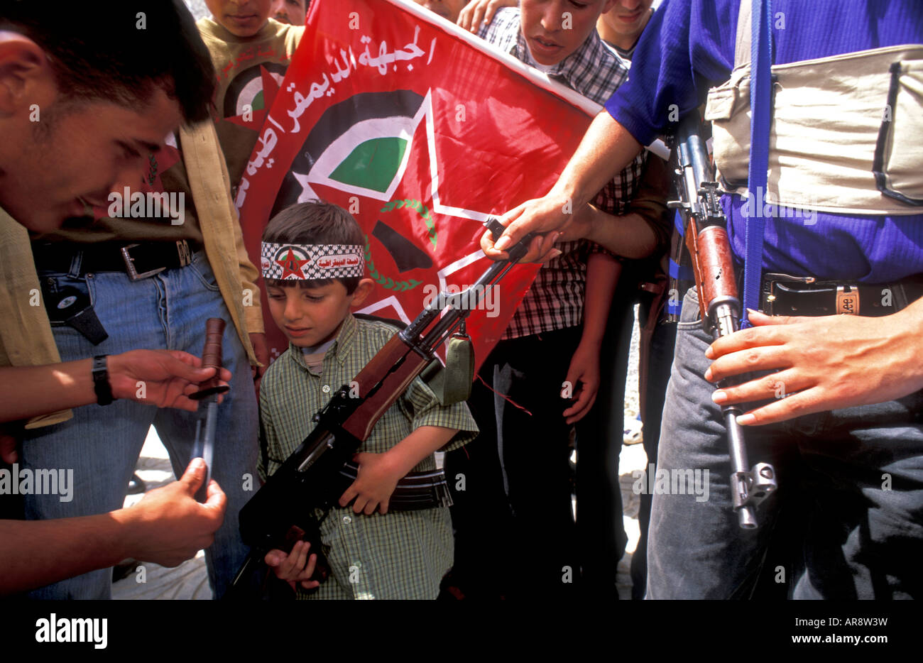 Palestine boy gun hi-res stock photography and images - Alamy