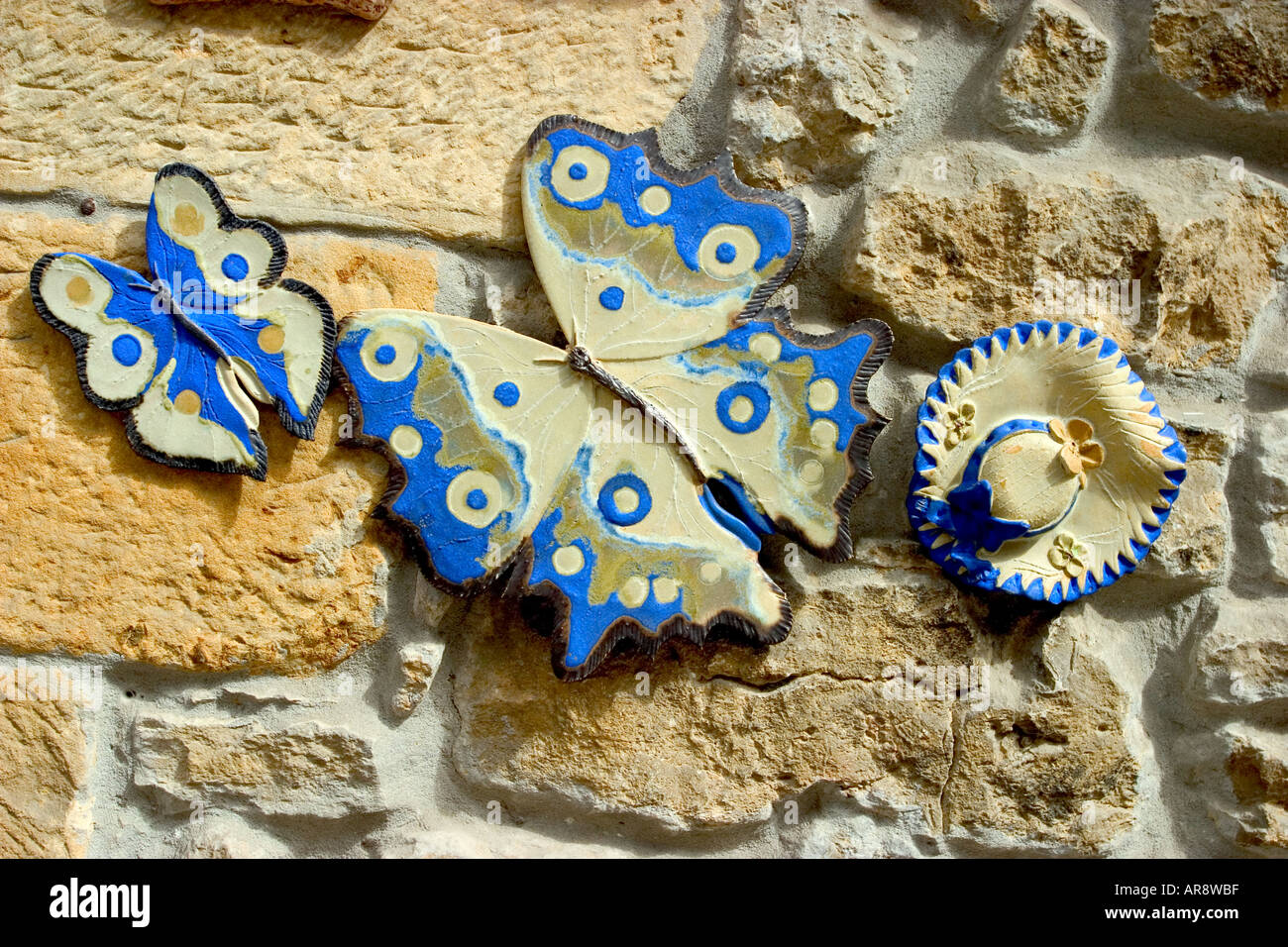 Potery and decorated butterfly Stock Photo - Alamy