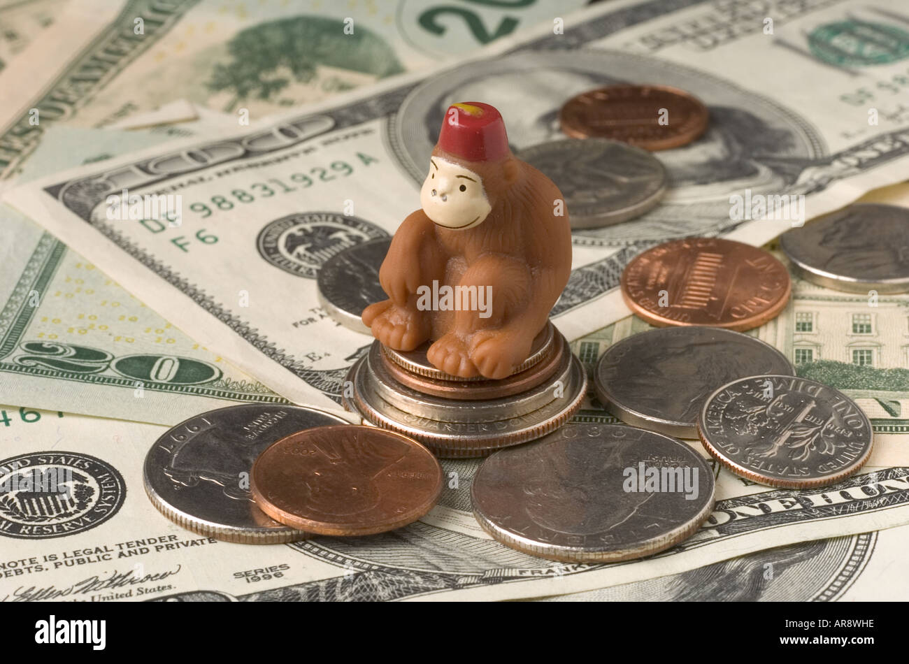 monkey and money Stock Photo - Alamy