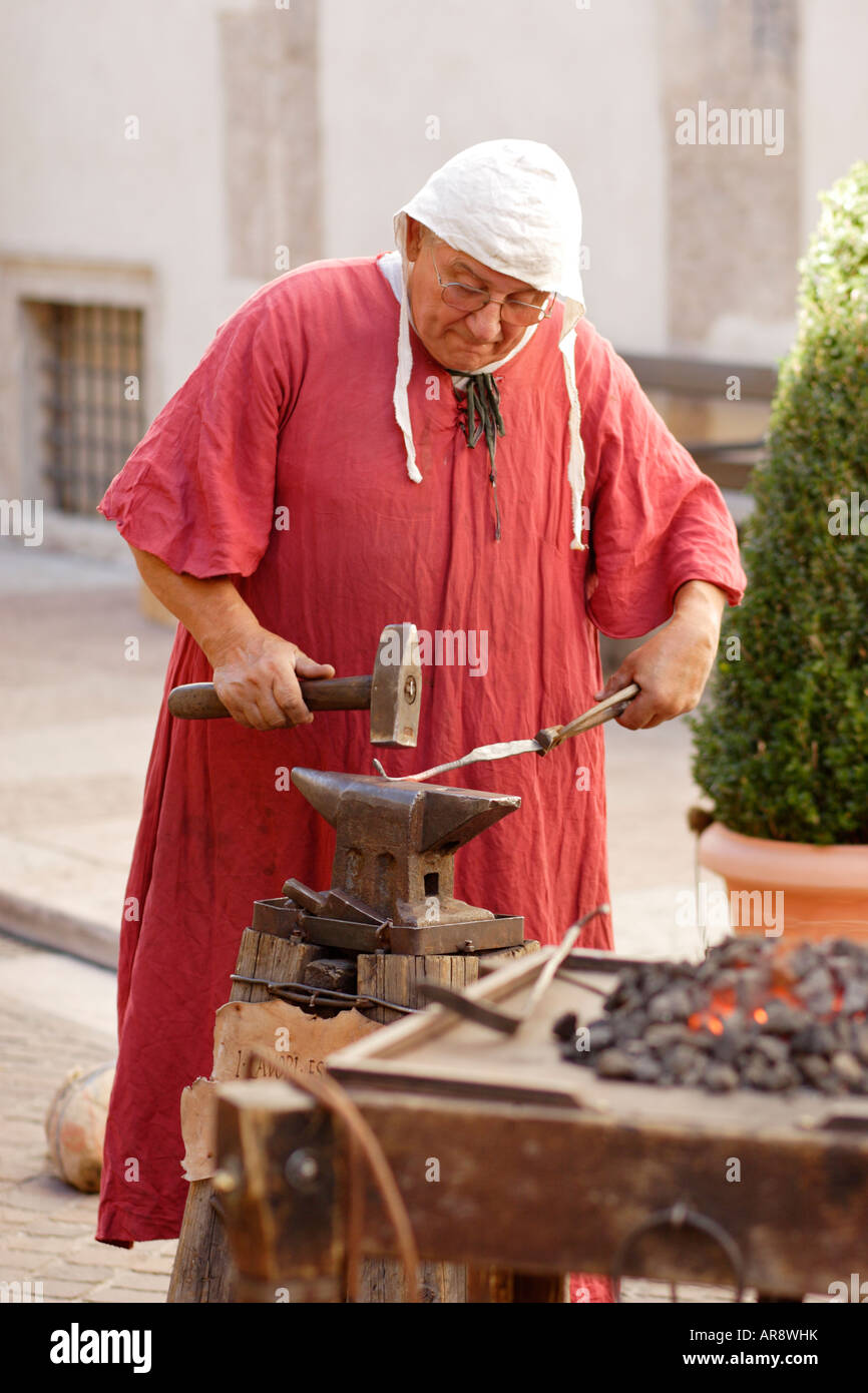 Man medieval festival blacksmith hi-res stock photography and images ...
