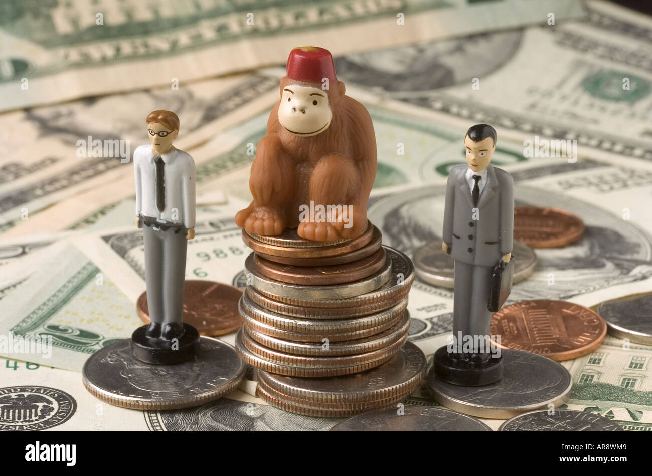 monkey, men and money Stock Photo - Alamy
