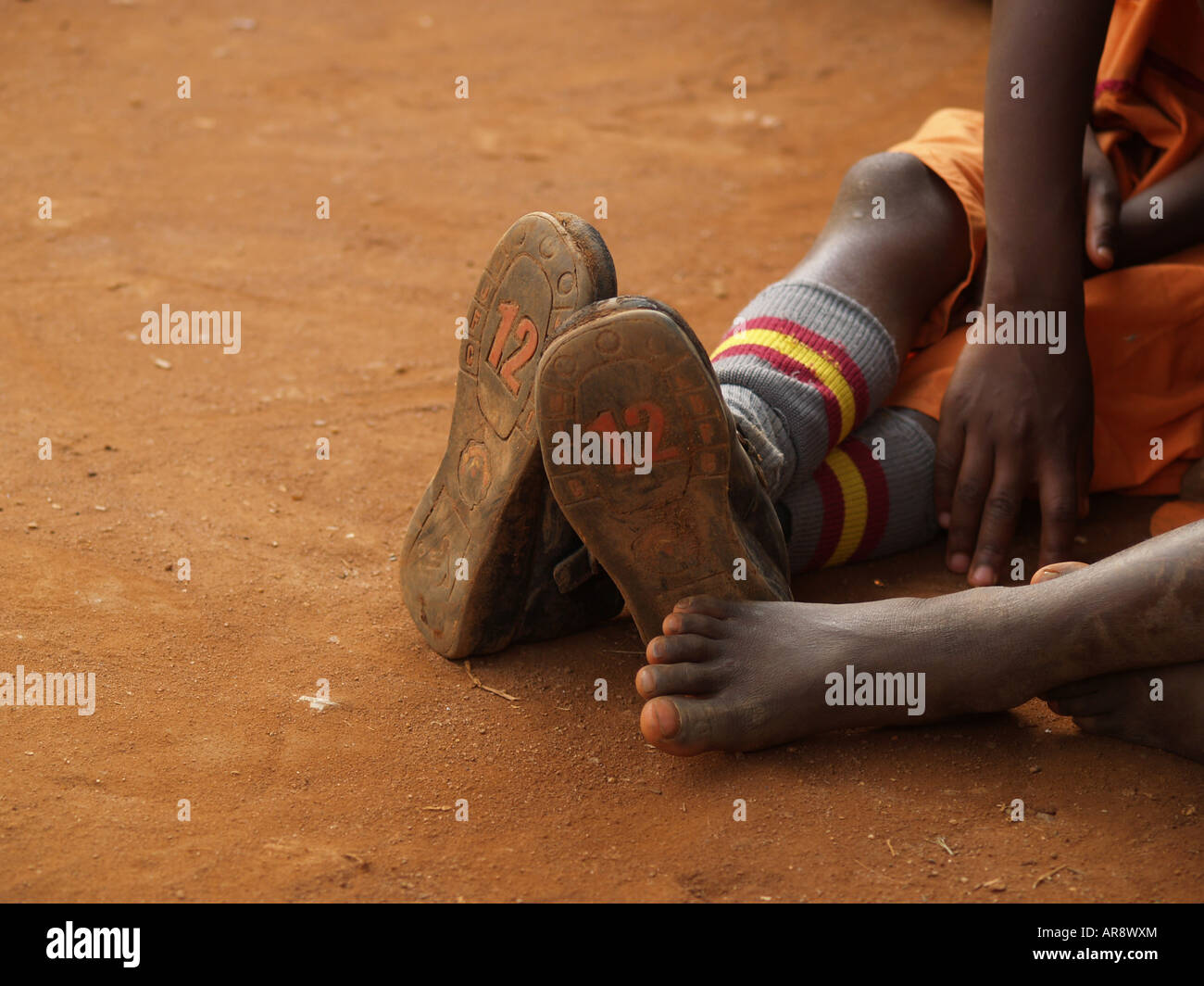 Feet in a school playground in Uganda Stock Photo - Alamy