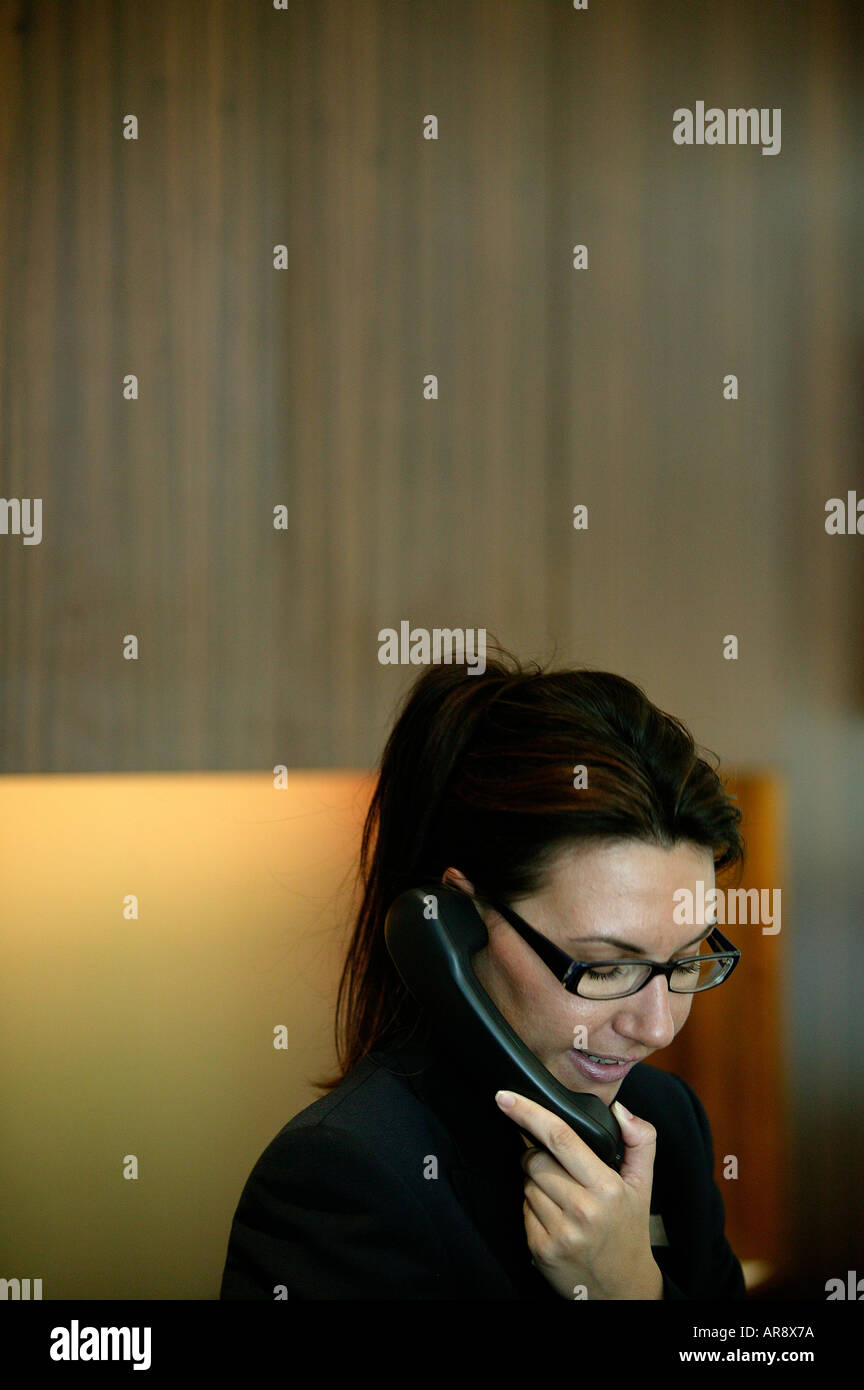 Woman on telephone Stock Photo - Alamy