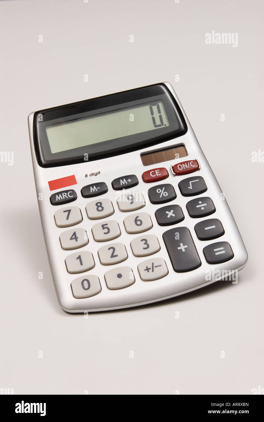 an office calculator on a white background Stock Photo - Alamy