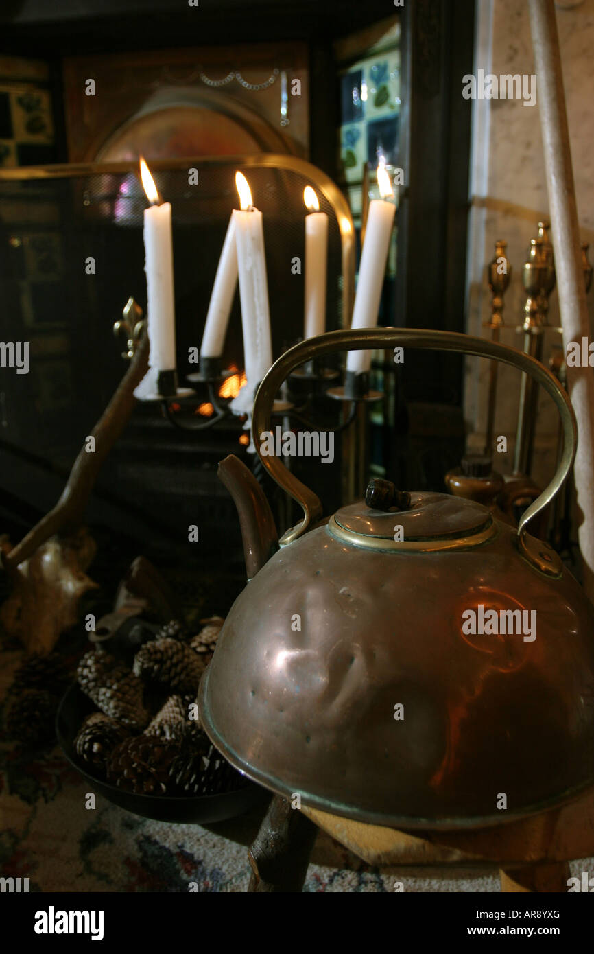 Tea pot by the fire Stock Photo - Alamy
