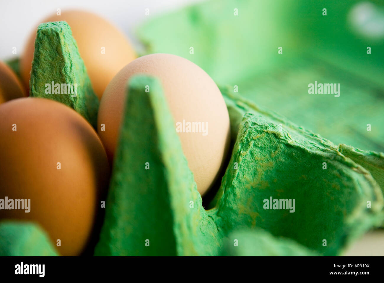 Egg Box with four Eggs Stock Photo - Alamy